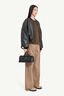 Faux leather jacket with rib-knit trim
